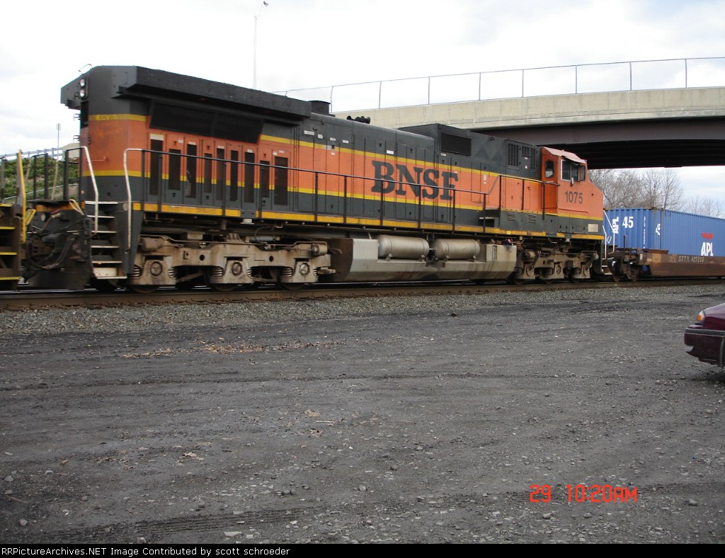 BNSF 1075 runs long hood forward WB on the CSX Q165